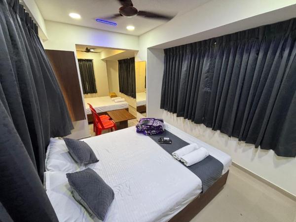 Dwarka Lodging - Pune