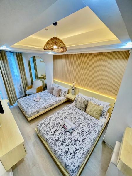 1 Bedroom Nami Suite Japandi-inspired By The Bali Corner At Azure North, Corner Unit With Big Balcony And Amazing Full View Of The Beach Resort Amenities - San Simon
