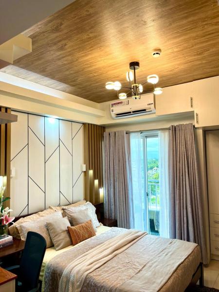 Cozy Studio Near Abreeza Mall A Balcony With City And Sea View - Davao City
