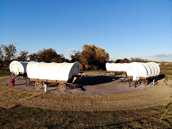 Perfect Glamping Vacations In This Rustic Conestoga Covered Wagon Rental In Oklahoma - Norman, OK