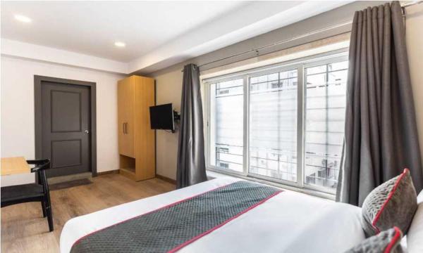 Townhouse Lake Town Clock Tower Formerly Crown Comfort - Kalkutta