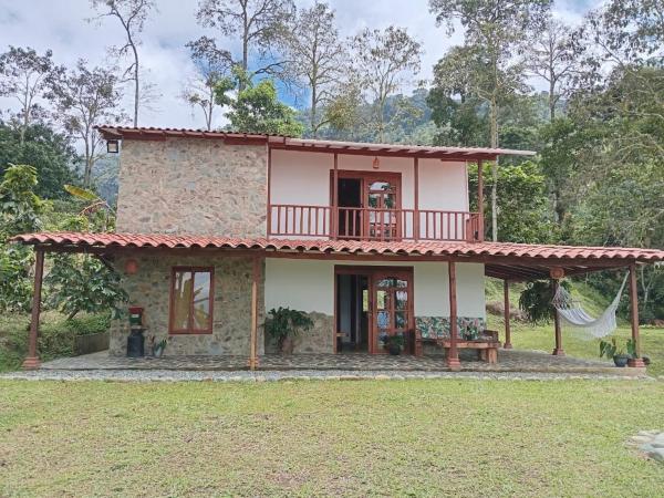 Rural Cabin Among Clouds - Colombia