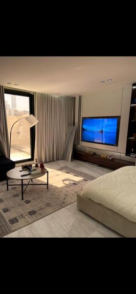 استديو بجلسة خارجية مطلة على كافد المالية - Riyadh