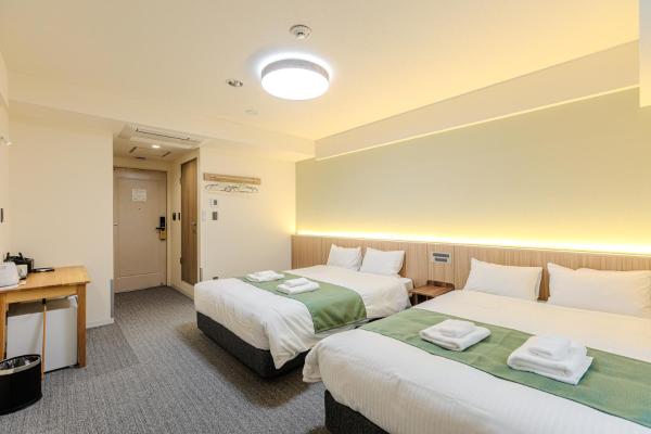 アメ村ガーデンホテルAmemura Garden Hotel - Matsubara