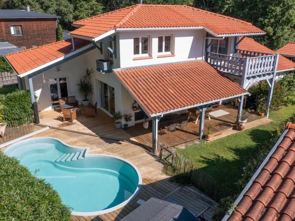 Villa Moderne à Biscarrosse - 5 Chambres, Piscine Chauffée, Proche Lac, Piste Cyclable - Biscarrosse