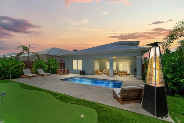 Peacock Palace Brand New Heated And Chilled Pool Golf Gym - Stuart, FL