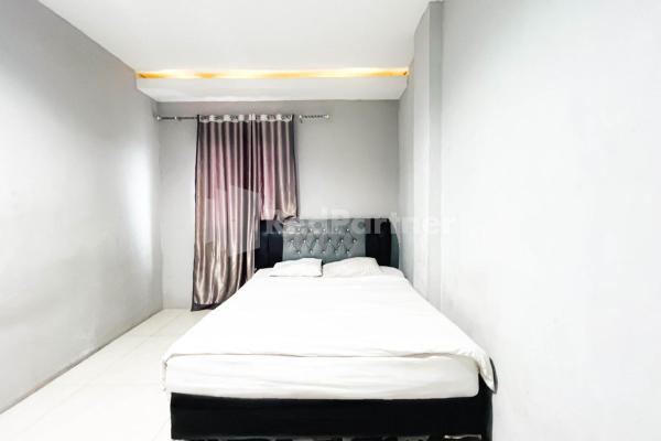 Golden Ritz Homestay Medan Mitra Reddoorz - Medan