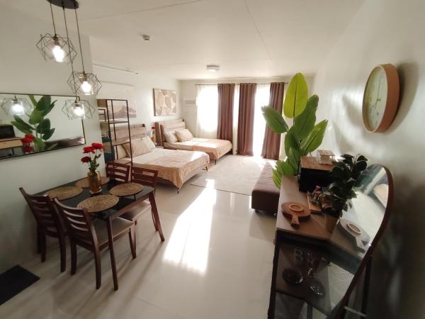 Puerto Princesa Studio Condo With 2 Large Beds, Balcony, Pool & Gym - Puerto Princesa