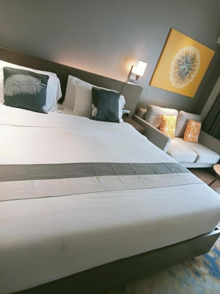 Novotel Residence Hotel By Jolly Luxe Suites - Taguig