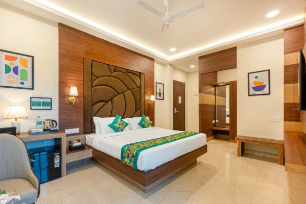 Treebo Premium Pine Tree Courtyard - Chennai