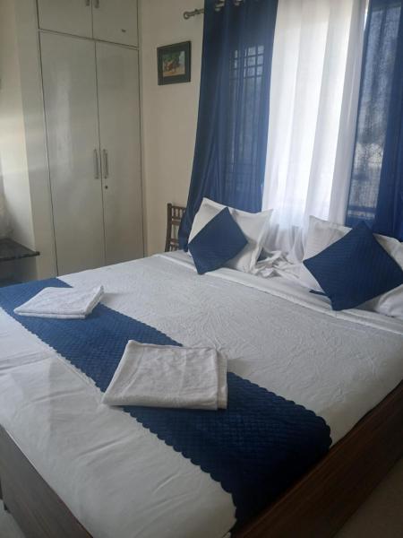 Capital Comfort Suites - Új-Delhi