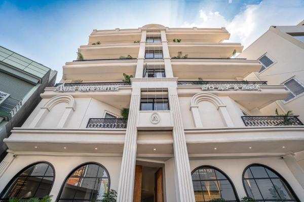 Aura Inn & Suites - Mysuru