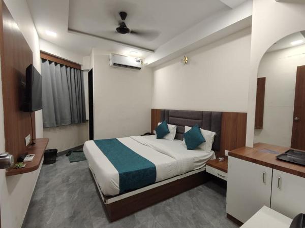 Hotel Earth Inn, Subhash Bridge, Rto Circle, Ahmedabad - Ahmedabad