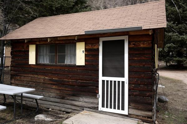 Simple Country Cabin With Ornate Wood Stove In The Colorado Mountains Of Poudre Canyon - Colorado
