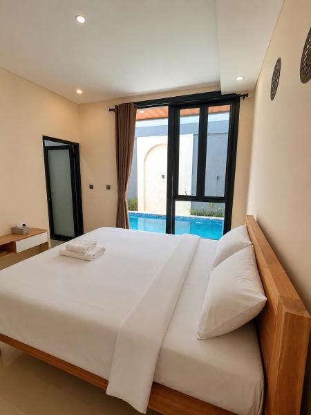 Cozy Poolside Room At Guesthouse Zio - Denpasar
