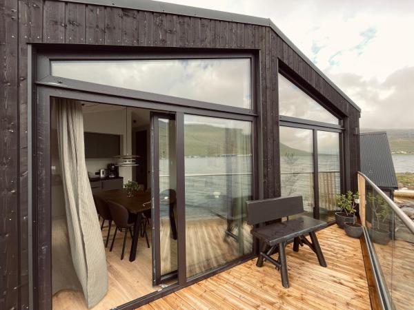 Boathouse - Unique Retreat - Fjord Views - Faroe Islands