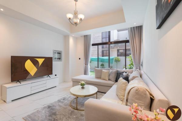 Vogue Vacation Homes, Wadi Al Safa The Fields By Elie Saab, Four Bedroom Plus Maid's Room Villa With Private Backyard, Large Patio And Vibrant Community View, Access To All Amenities - Dubai