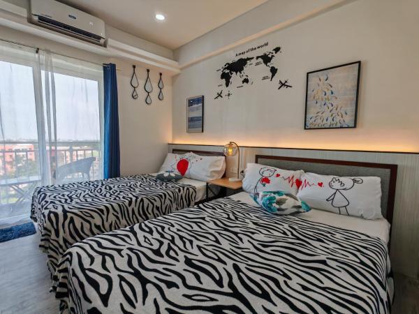 Condo Azur Suites A732, Amani Resorts Residences, 5 Minutes Airport, Netflix, Stylish, Cozy With Luxurious Swimming Pool - Liloan