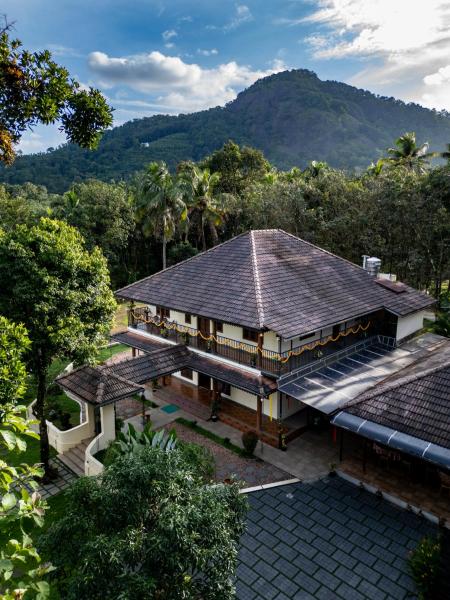 Elivaas Signature Pochan's Zen 3 Bhk Heritage Home With Banquet, Kids' Play Area, Sit Out , Garden & Verandah - Kothamangalam