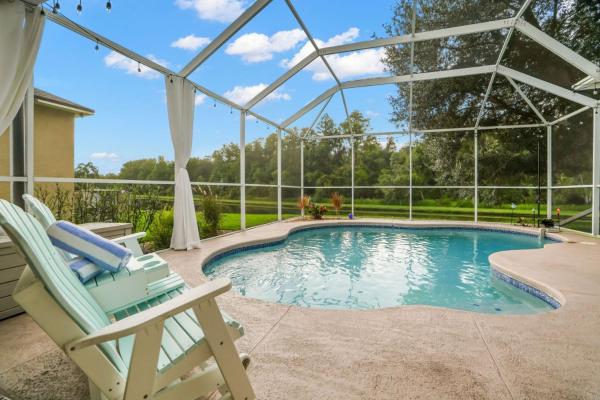 Land O Lakes Lagoon | Private Heated Pool | Lake Front | Luxurious Home - Land O' Lakes, FL