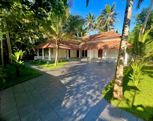 Mantra Inn Munroe - Karunagappalli