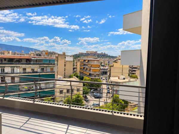 Orange Building Athens By Phos Living - Athens